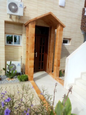 Suite Familiar, quartos comunicantes | Vista para o pátio