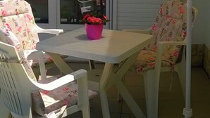 Apartamento, 1 quarto, fumadores, varanda | Refeições ao ar livre