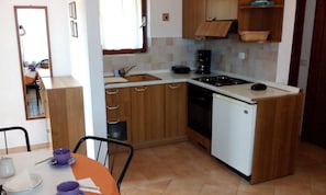 Apartamento, pátio, Vista para a cidade | Restaurantes