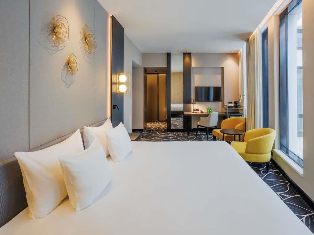 Quarto executivo, 1 cama King | Roupas de cama premium, frigobar, cofres nos quartos, escrivaninha