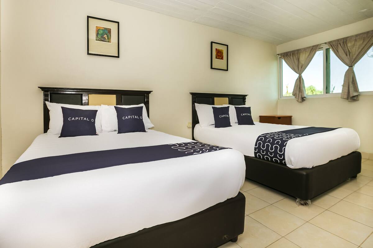 Quarto Standard, 2 camas de casal | Ferro/tábua de engomar, Wi-fi grátis, roupa de cama fornecida