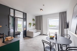 Apartamento Familiar | Sala de estar | TV de ecrã plano 