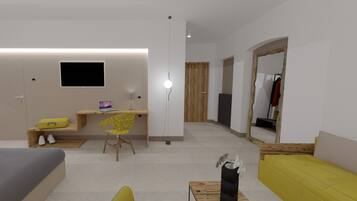 Quarto de hotel moderno com uma cama, uma escrivaninha com computador, uma cadeira, uma pequena mesa com um vaso e um espelho.