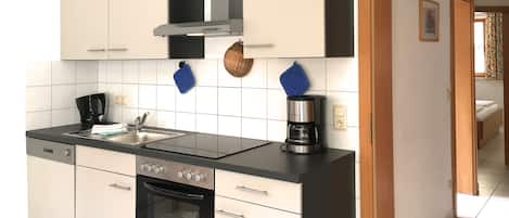 Apartamento | Cozinha privada | Cadeirão de bebê