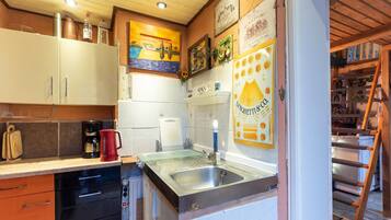 Apartamento | Cozinha privada | Geladeira