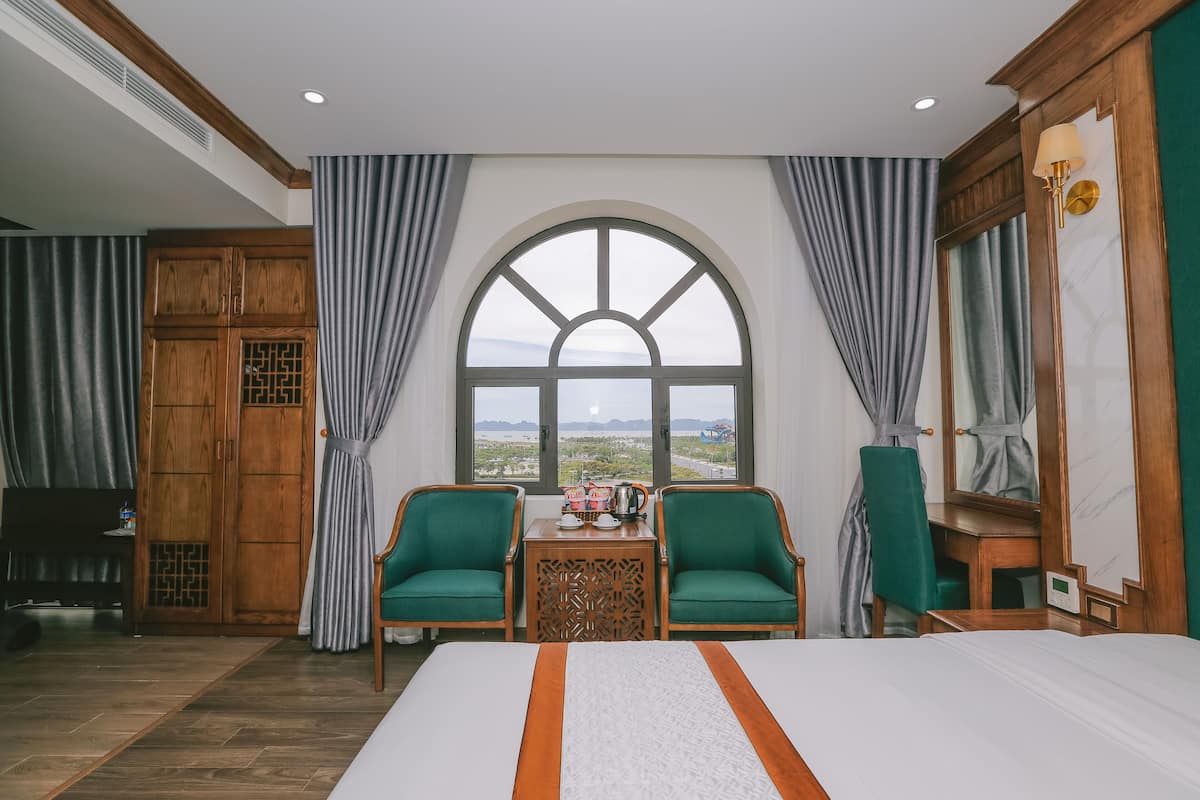 Suíte júnior, vista para o mar | 1 quarto, roupas de cama premium, edredons de pluma
