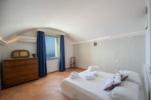 Apartamento, 2 quartos | Ferros/tábuas de passar roupa, berços grátis, Wi-Fi de cortesia