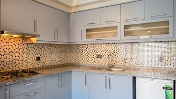 Quarto duplo família | Cozinha privada | Frigobar