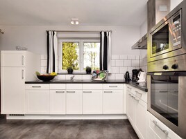 Casa | Cozinha privada | Cadeirão de bebê