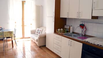 Casa | Cozinha privada | Um micro-ondas, uma cafeteira/bule