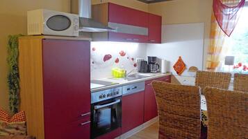 Apartamento | Cozinha privada | Cadeirão de bebê