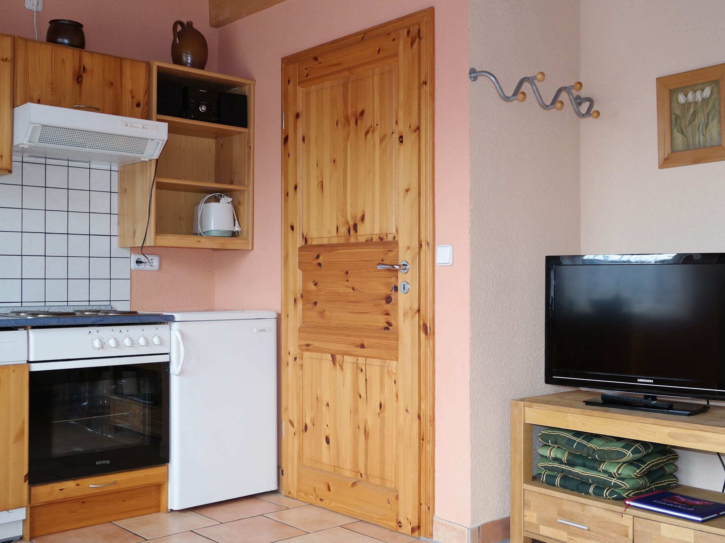 Bungalow | Cozinha privada | Uma cadeira de bebé 