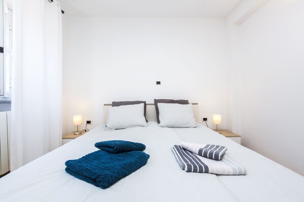 Apartamento, 2 quartos | 2 quartos, Wi-Fi de cortesia, roupa de cama