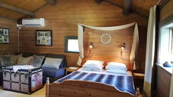 Cabine (Guldgrävarstugan) | Ferro/tábua de engomar, berços/camas para crianças, Wi-fi grátis