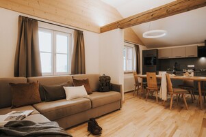 Apartamento luxo | Área de estar | TV de tela plana