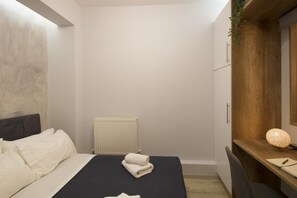 Apartamento, 1 quarto | 1 quarto, roupas de cama premium, espaço de trabalho para notebook