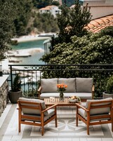 Apartamento de Luxo, vista parcial para o mar | Terraço/pátio interior