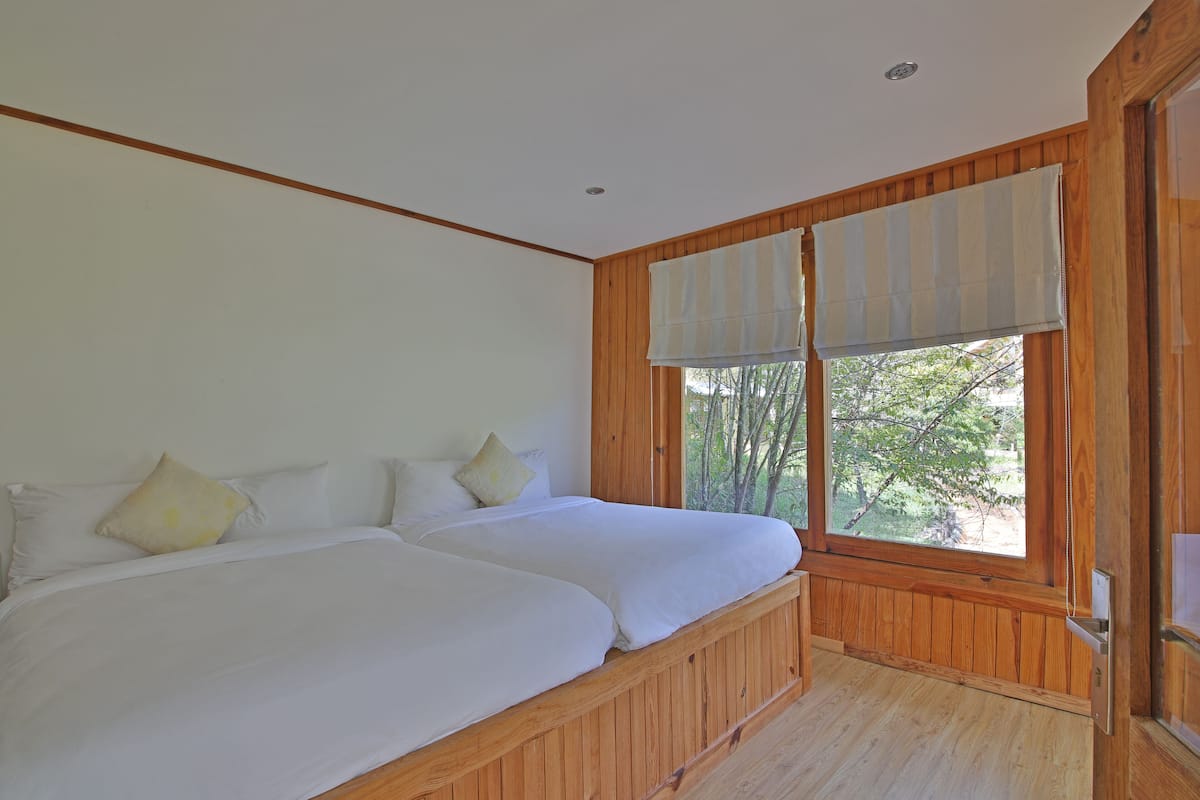 Quarto (Camelia Cottage 1) | Frigobar, escrivaninha, espaço de trabalho para notebook