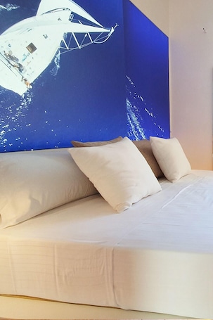 SuĆte jĆŗnior | 2 quartos, roupas de cama premium, frigobar, escrivaninha