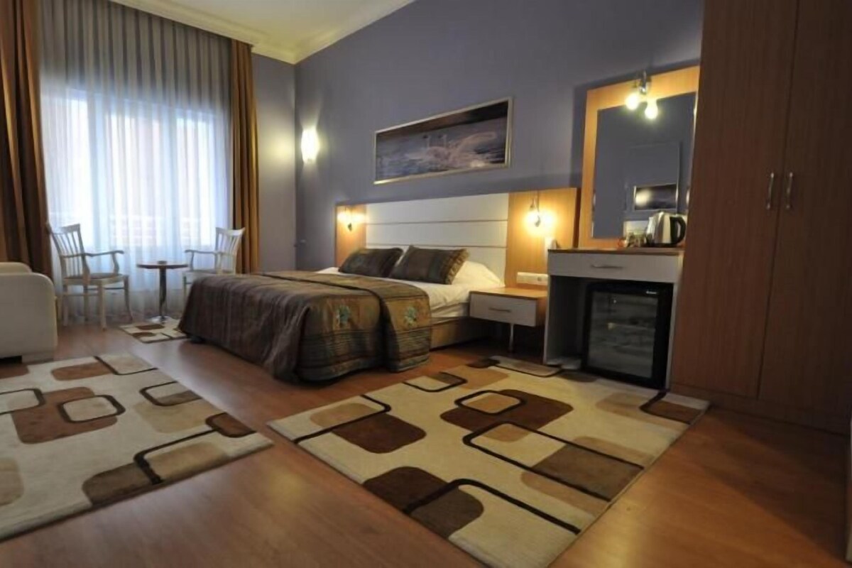 Minibar, quartos insonorizados, ferro/tábua de engomar, Wi-fi grátis 