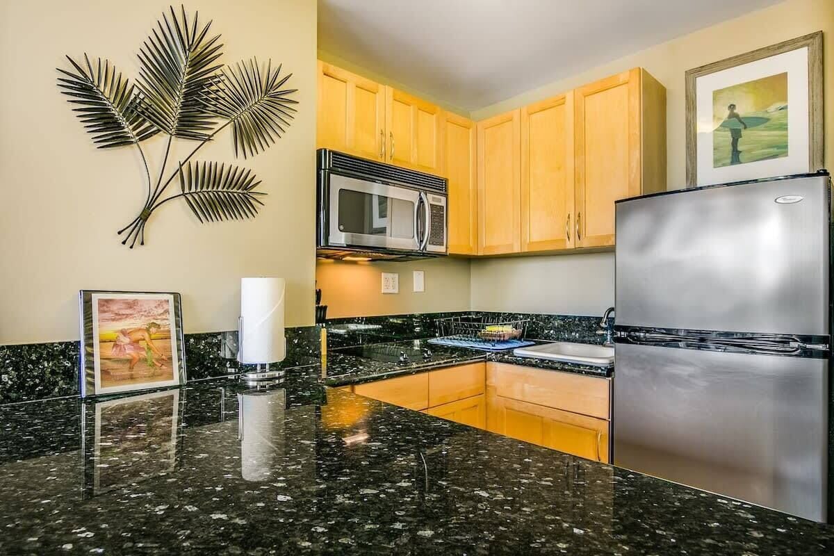 Apartamento Deluxe (1 Bedroom) | Cozinha privada | Uma cafeteira/bule, utensílios de cozinha 