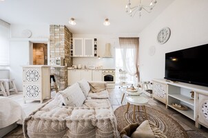 Estúdio Premium | Sala de estar | Smart TV de 138 de cm com canais via satélite, televisor, Netflix 