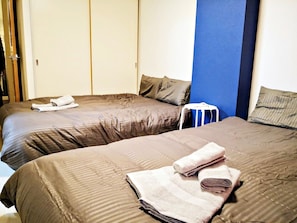 Apartamento, 2 quartos | 2 quartos, cortinas blackout, ferros/tábuas de passar roupa