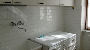 Apartamento, 2 quartos, varanda (Nazionale 131 Big) | Cozinha privada | Uma cafeteira/bule, um frigorífico/congelador grande, um forno 