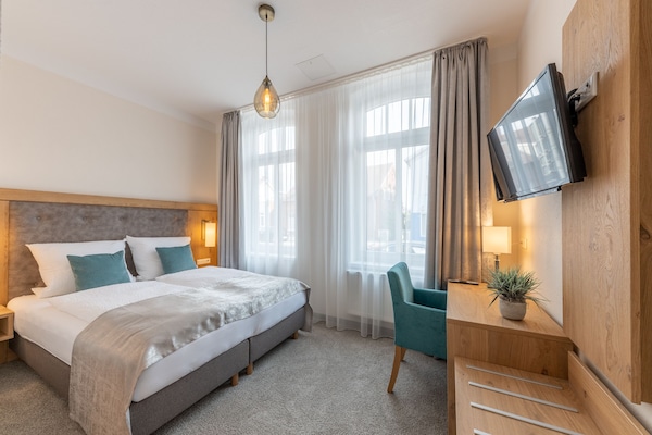 Quartos insonorizados, Wi-fi grátis, roupa de cama fornecida