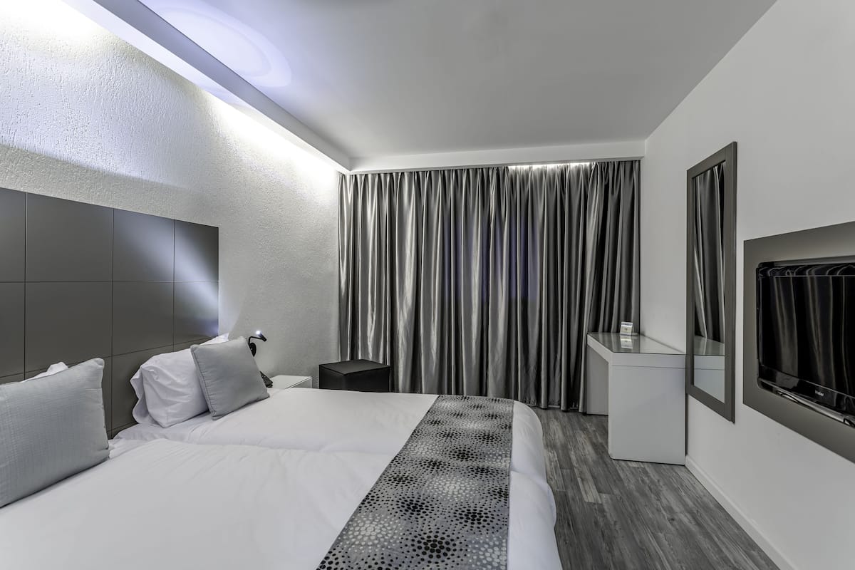 Quarto Standard | Cofre no quarto, secretária, ferro/tábua de engomar, Wi-fi grátis