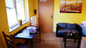 Estúdio Comfort | Sala de estar | Smart TV de 50 polegadas com canais por cabo, televisor