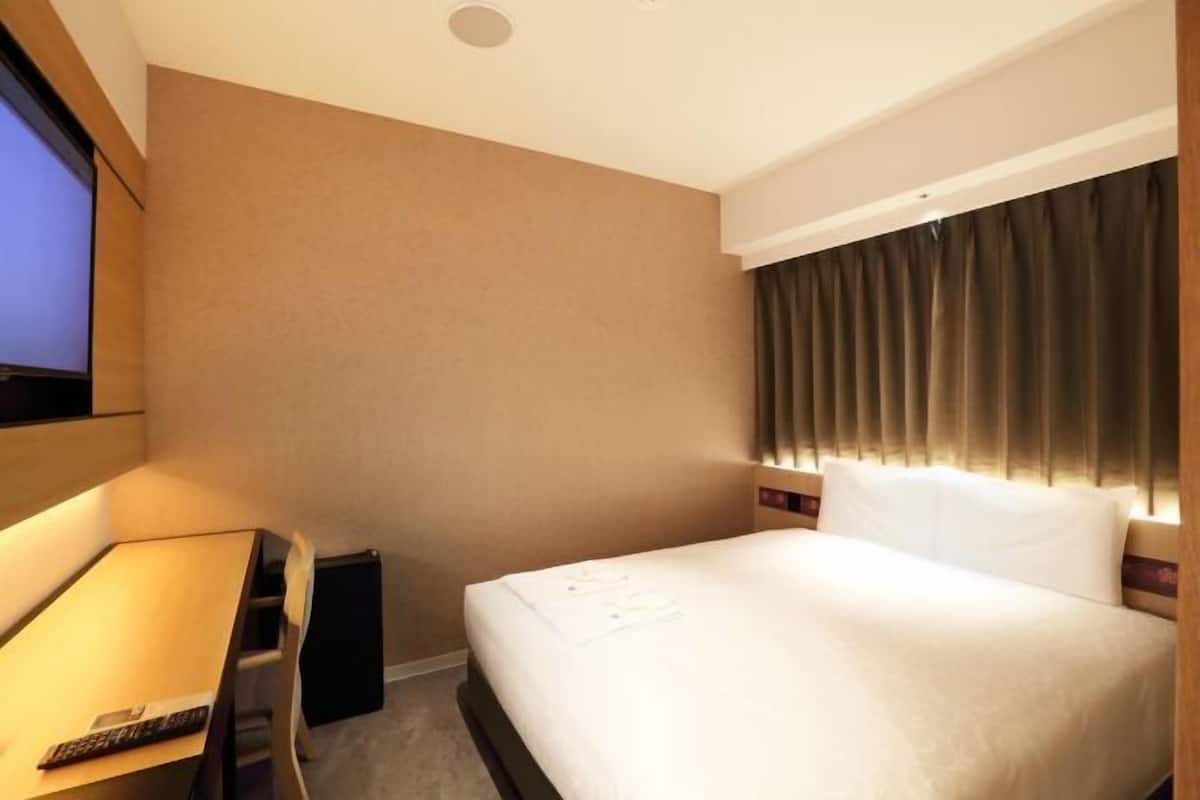 Cofres nos quartos, cortinas blackout, Wi-Fi de cortesia, roupa de cama