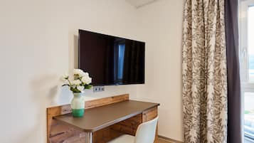 Quarto solteiro empresarial | Comodidades do quarto