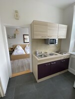 Apartamento, 2 quartos (Nr. 2) | Cozinha privada | Mesas de jantar