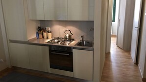 Apartamento, 1 quarto, pátio, Vista para a cidade | Cozinha privada