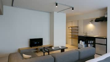 Apartamento em Condomínio Fechado, 1 quarto (601) | Sala de estar | Televisor