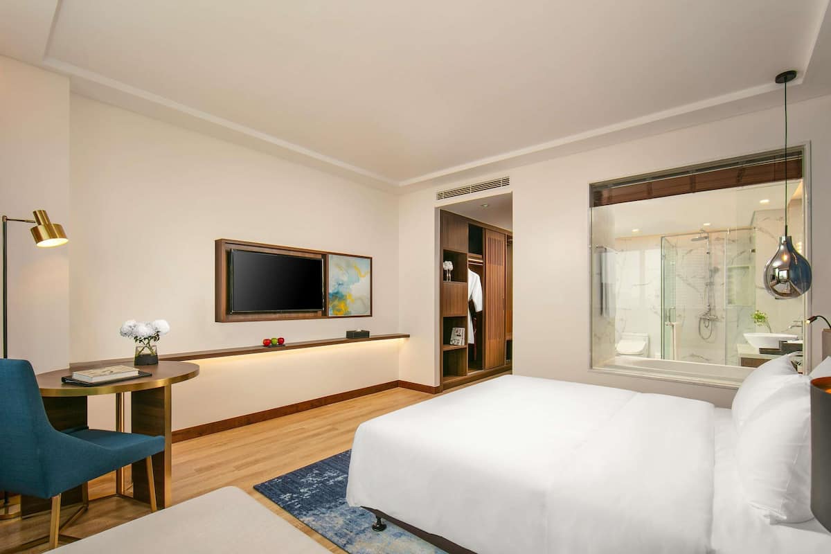 Quarto executivo, 1 cama King | Frigobar, cofres nos quartos, escrivaninha, cortinas blackout