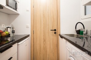 Estúdio | Cozinha privada | Geladeira, micro-ondas, cooktop, cafeteira/chaleira