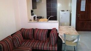 Apartamento, 1 quarto, para fumantes, sacada | Área de estar