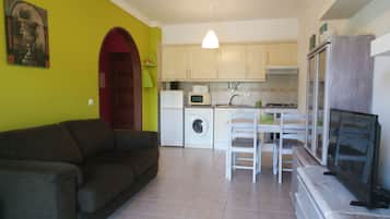 Apartamento, 1 quarto | Sala de estar