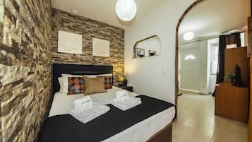 Apartamento, 1 quarto | 1 quarto, ferro/tábua de engomar, berços/camas para crianças