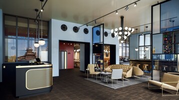Um interior moderno com uma mesa de recepção, área de estar e bar.