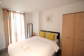 Apartamento, 2 quartos | 2 quartos, ferros/tábuas de passar roupa, Wi-Fi de cortesia