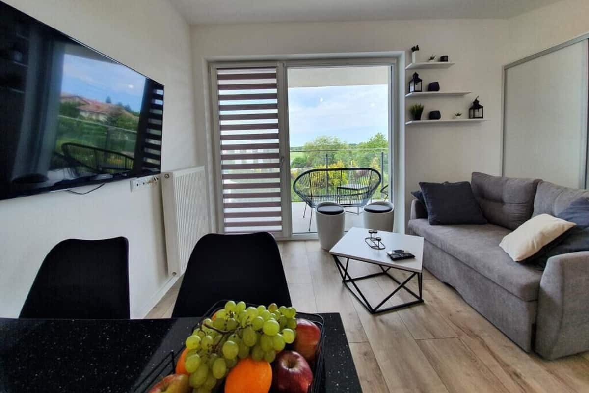 Apartamento | Área de estar | TV de tela plana