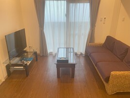 Quarto Triplo Familiar | Sala de estar | TV de ecrã plano 