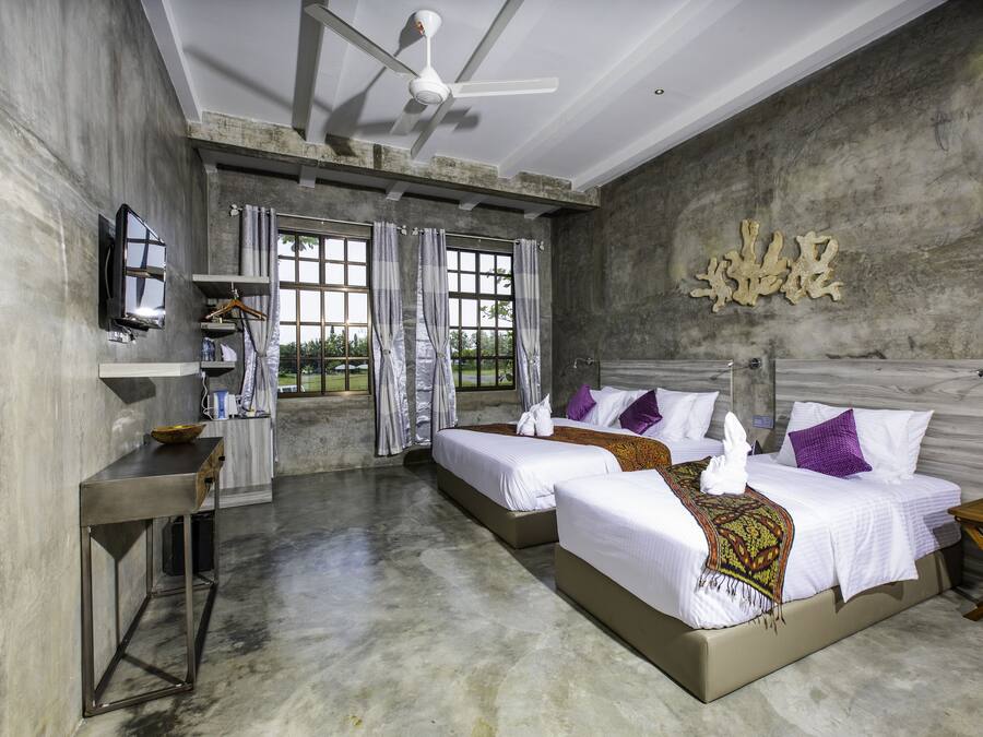 Quarto superior | Frigobar, ferros/tábuas de passar roupa, Wi-Fi de cortesia