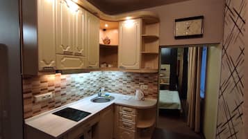 Apartamento superluxo, 1 quarto, sacada, vista para a cidade (34) | Cozinha americana privada | Geladeira, micro-ondas, cooktop, cafeteira/chaleira