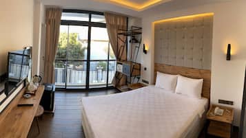 Quarto standard | Roupas de cama premium, camas Select Comfort, frigobar