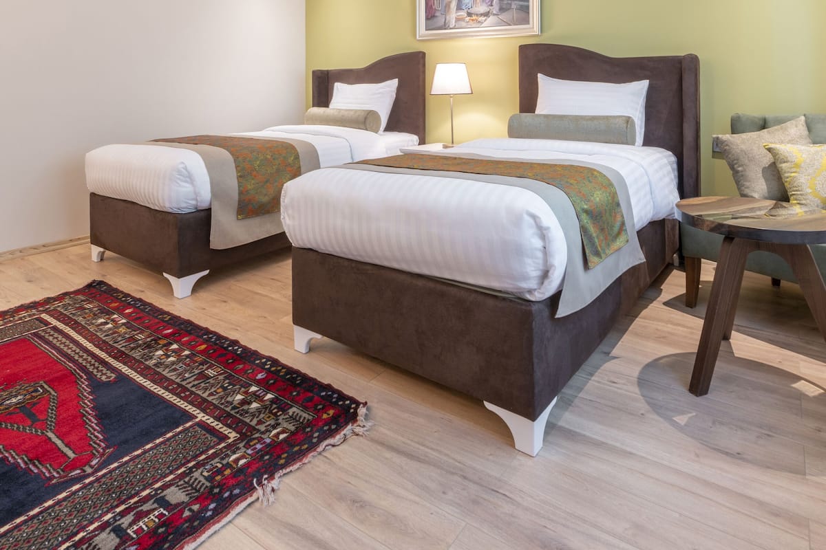 Standard Deluxe Room | Roupas de cama premium, frigobar (abastecido com alguns itens grátis)