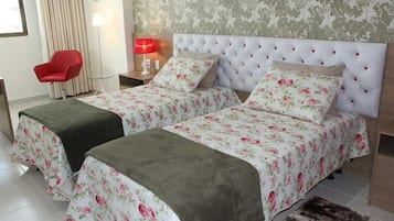 Quarto casal ou duplo luxo | Frigobar, quartos à prova de som, Wi-Fi de cortesia, roupa de cama